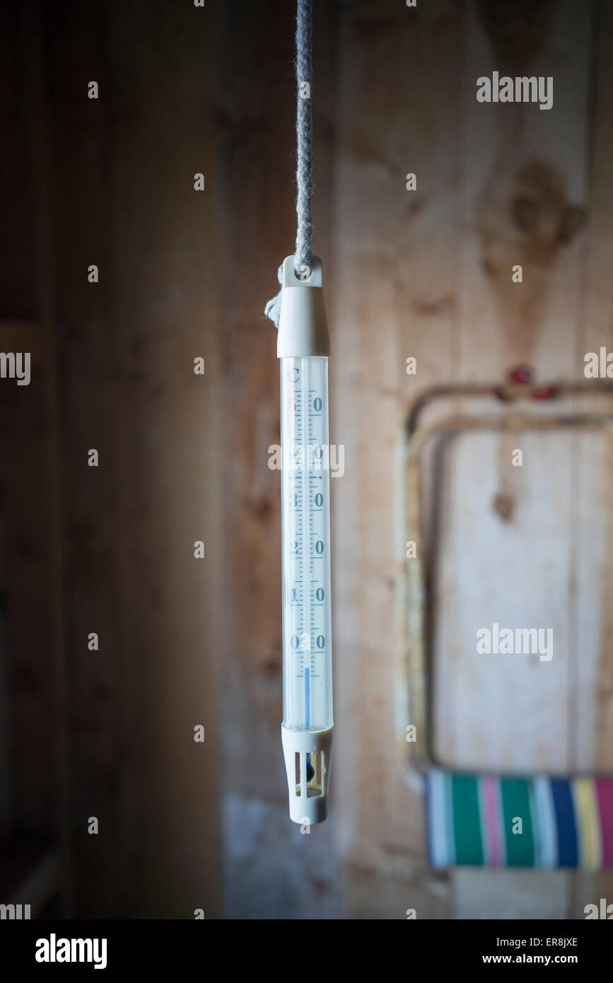 Garden thermometer hanging in room Stock Photo - Alamy