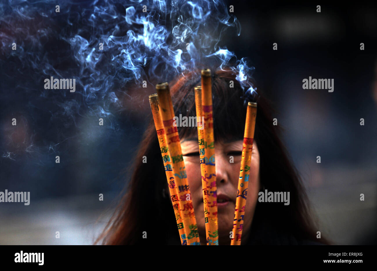 Feb 19, 2015-Huaibei, China- Chinese worshippers pray at a temple in ...