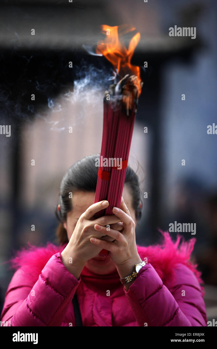 Feb 19, 2015-Huaibei, China- Chinese worshippers pray at a temple in ...