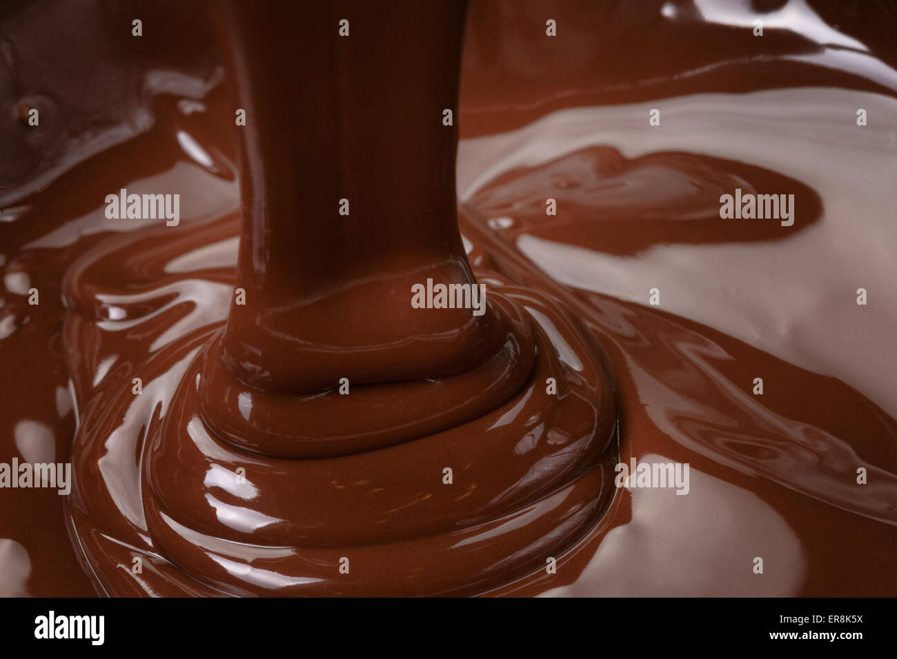 melted dark chocolate thik flow Stock Photo - Alamy
