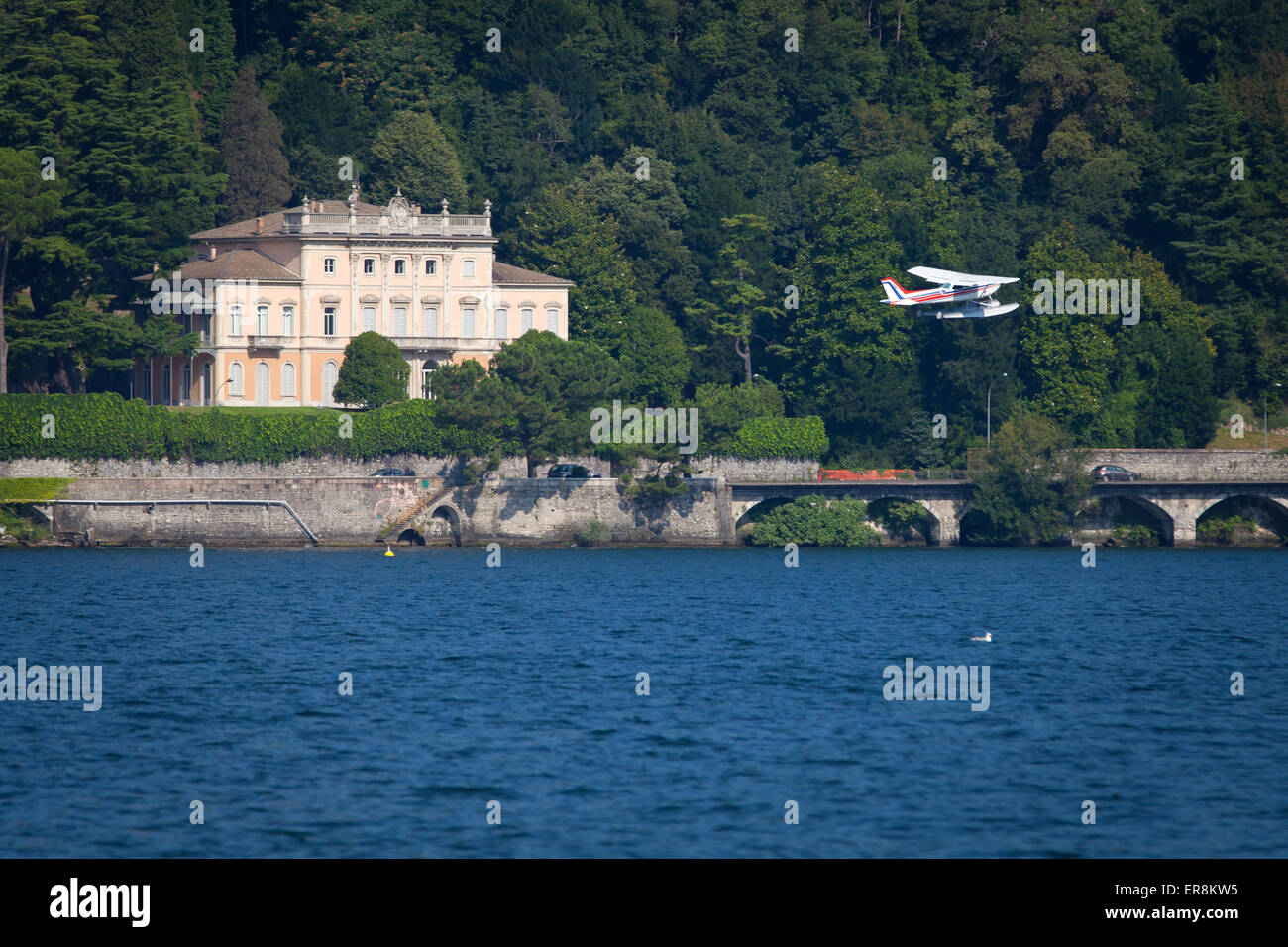 A Small Red and White Float Plane in Lake Como Stock Photo - Alamy