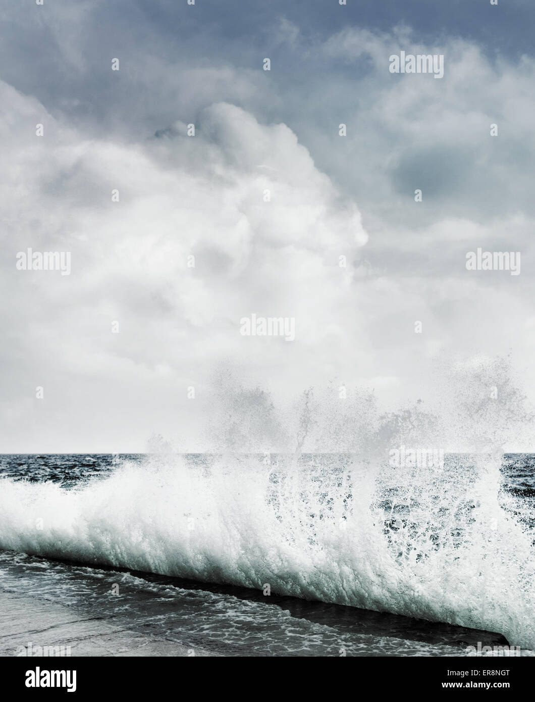 Big ocean wave breaking the shore Stock Photo - Alamy