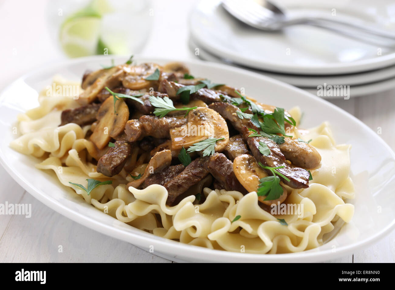 beef stroganoff with pasta, russian cuisine Stock Photo - Alamy