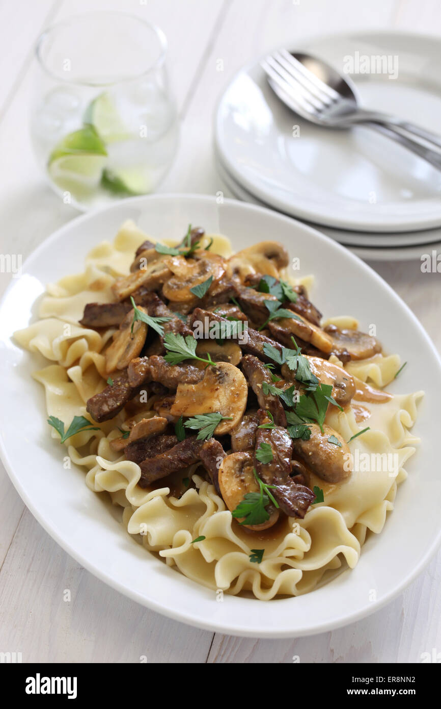 beef stroganoff with pasta, russian cuisine Stock Photo - Alamy