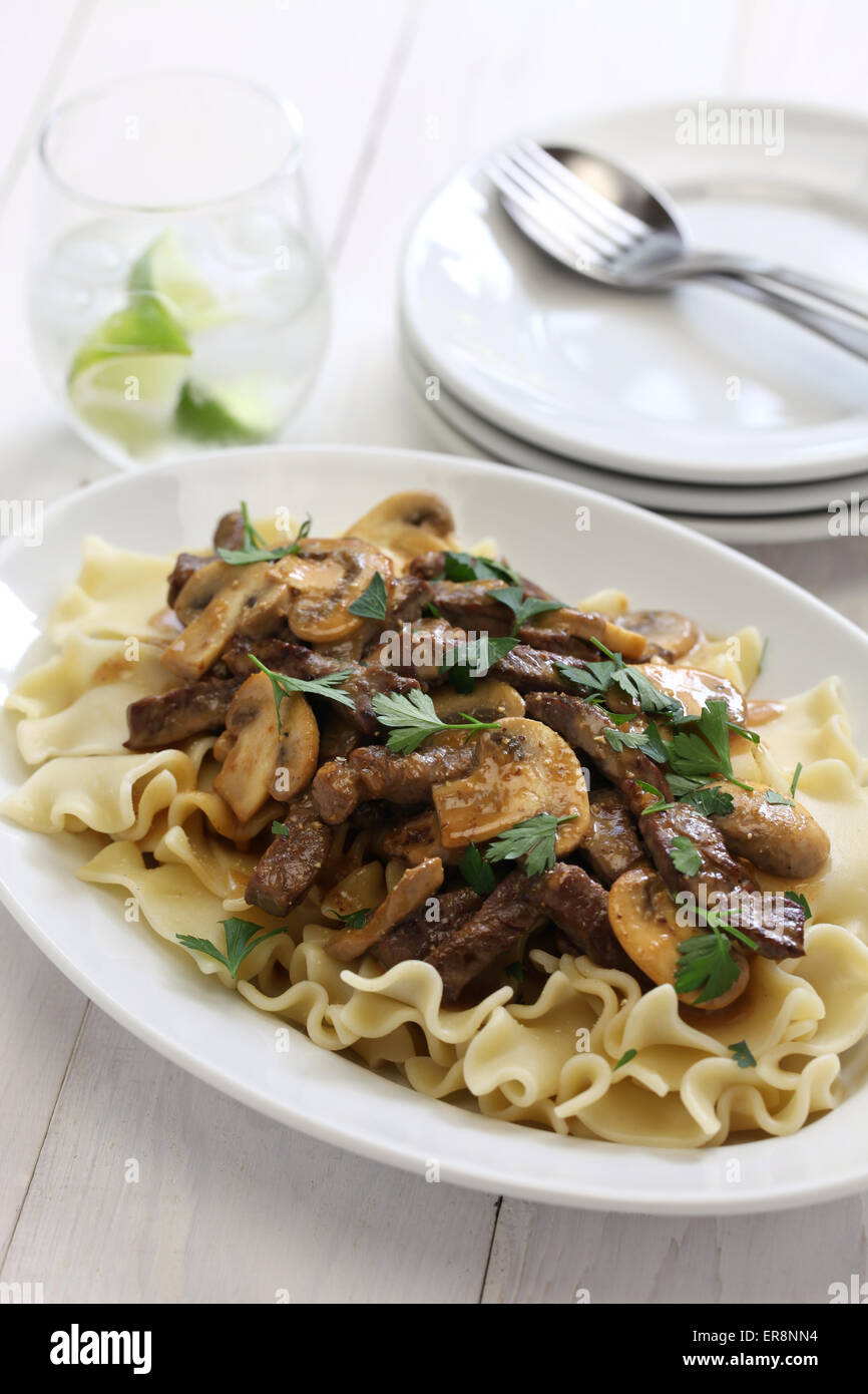 beef stroganoff with pasta, russian cuisine Stock Photo - Alamy