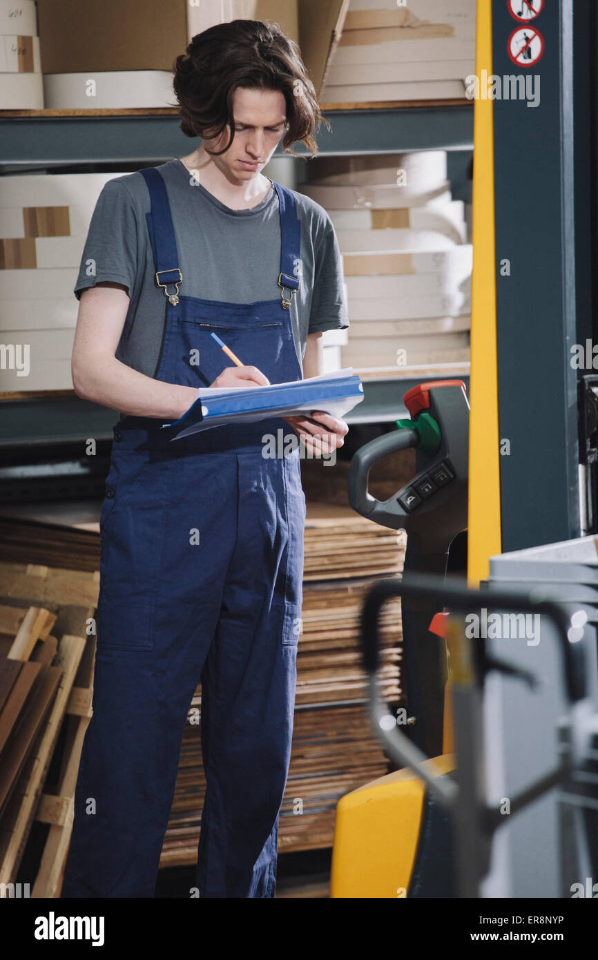 Machine part standing industry working manufacturing looking down ...