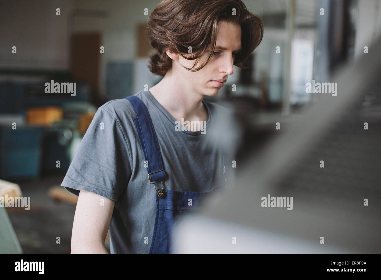 Machine part standing industry working manufacturing looking down ...