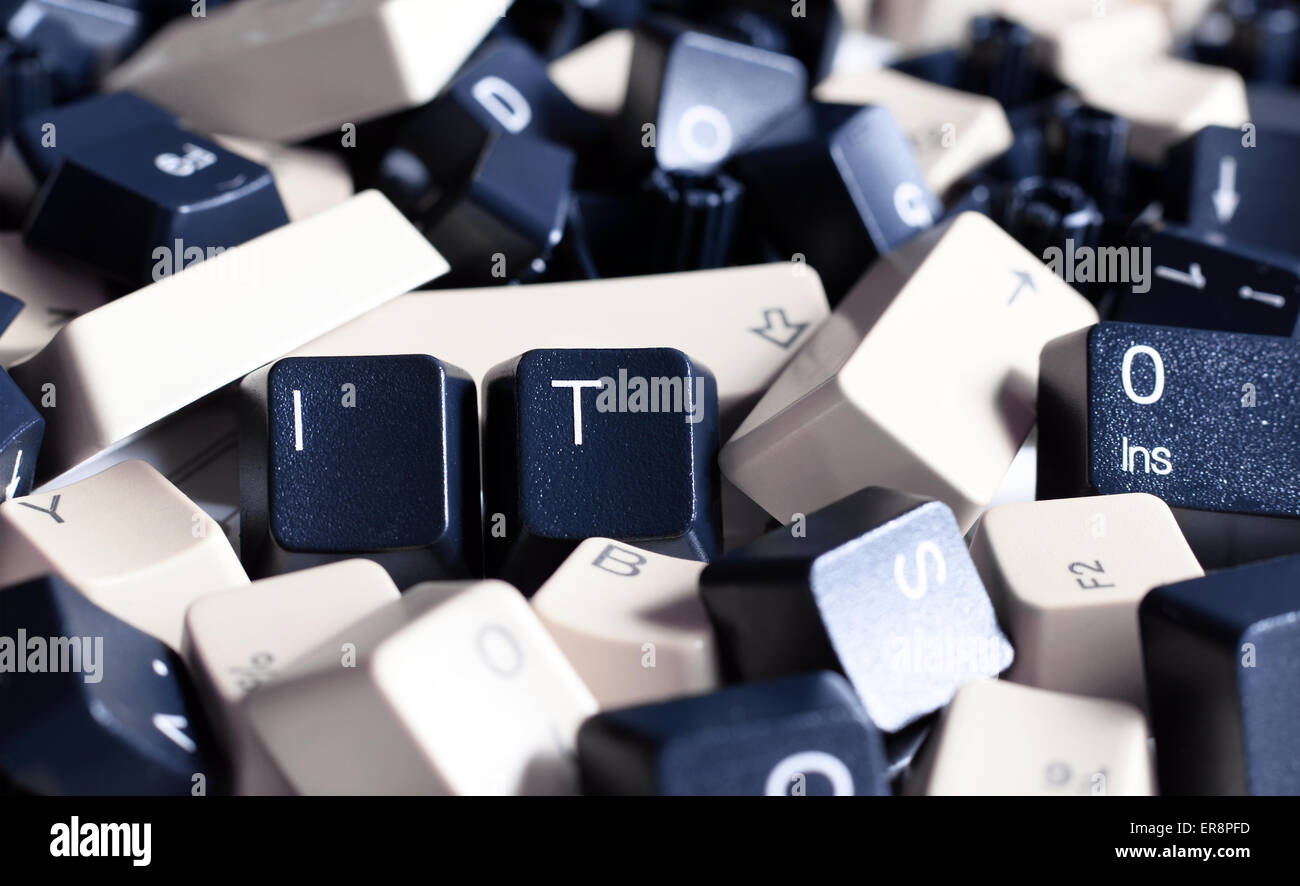 IT HELP, Close-up on IT keys on Pile of Black and White Computer ...