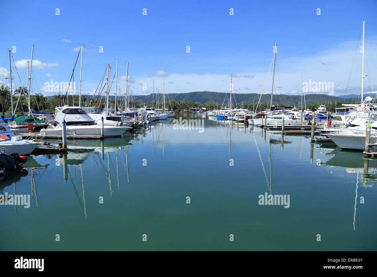 Beautiful reflections of boats moored at the Port Douglas Marina, Port ...