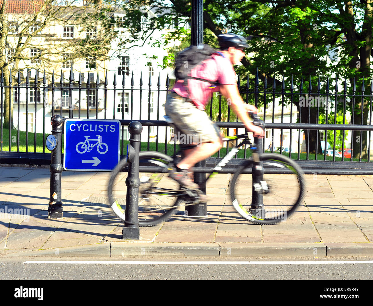 A cyclist passes a cycling sign as he cycles towards the Clifton ...
