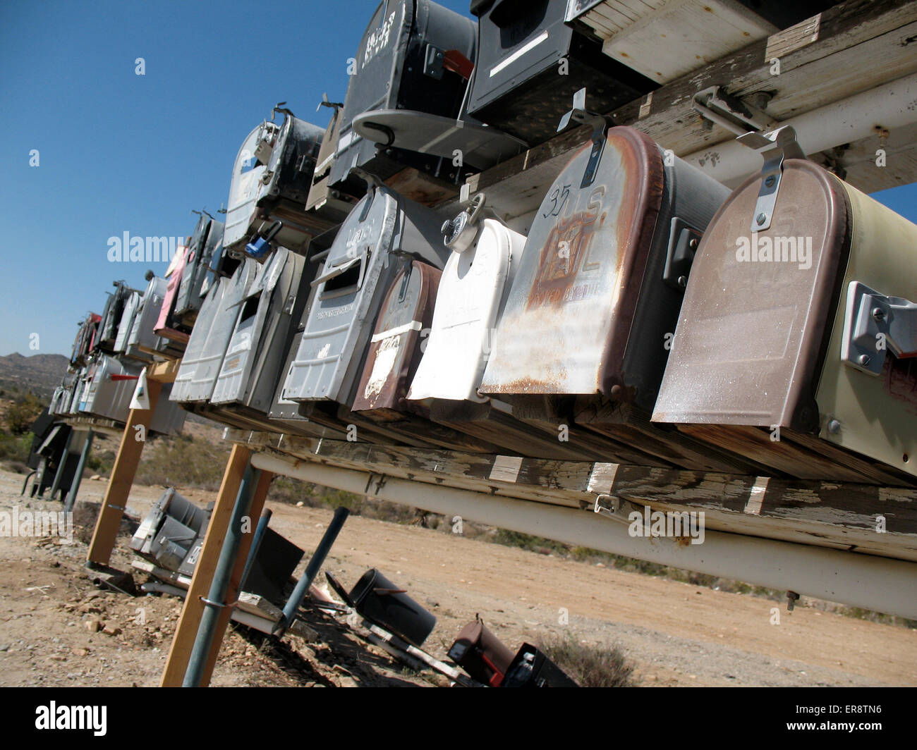 Grunge mail boxes in a row at Arizona desert USA Stock Photo - Alamy