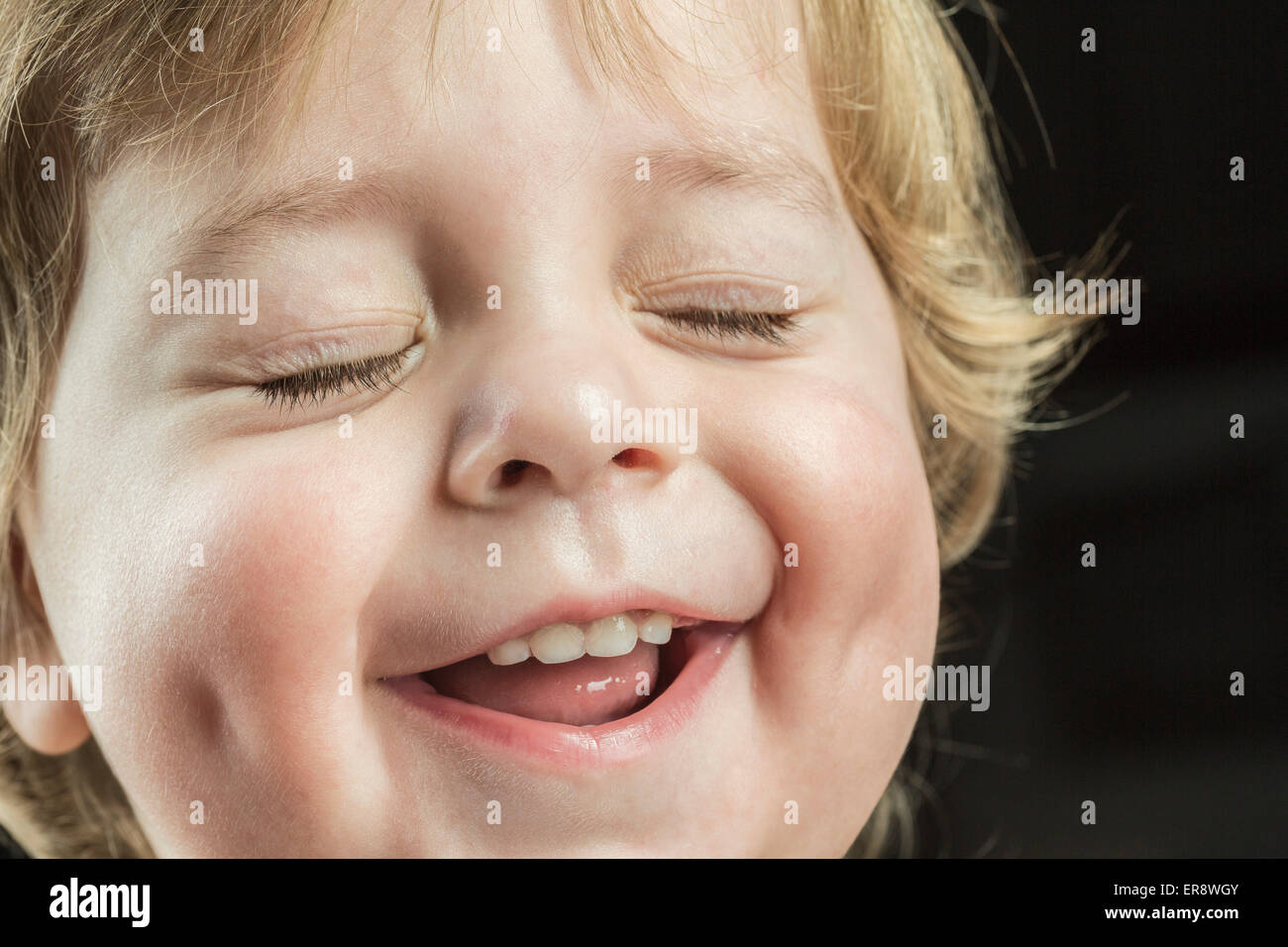 Black boy smiling hi-res stock photography and images - Alamy