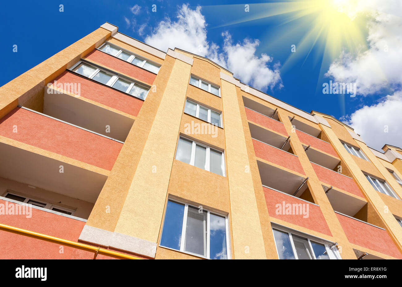New residential building against the sky on a sunny day Stock Photo - Alamy