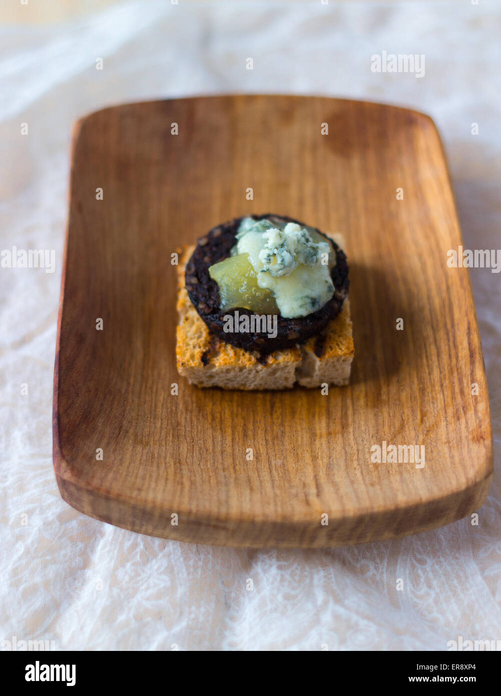 Black pudding and Blue Cheese canape Stock Photo - Alamy