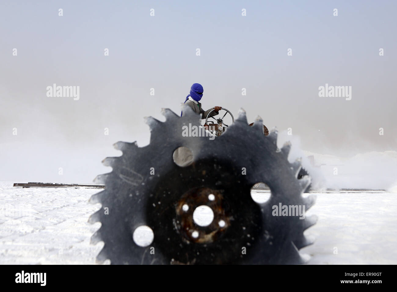 Minya, Egypt. 28th May, 2015. An Egyptian quarry worker is seen through ...