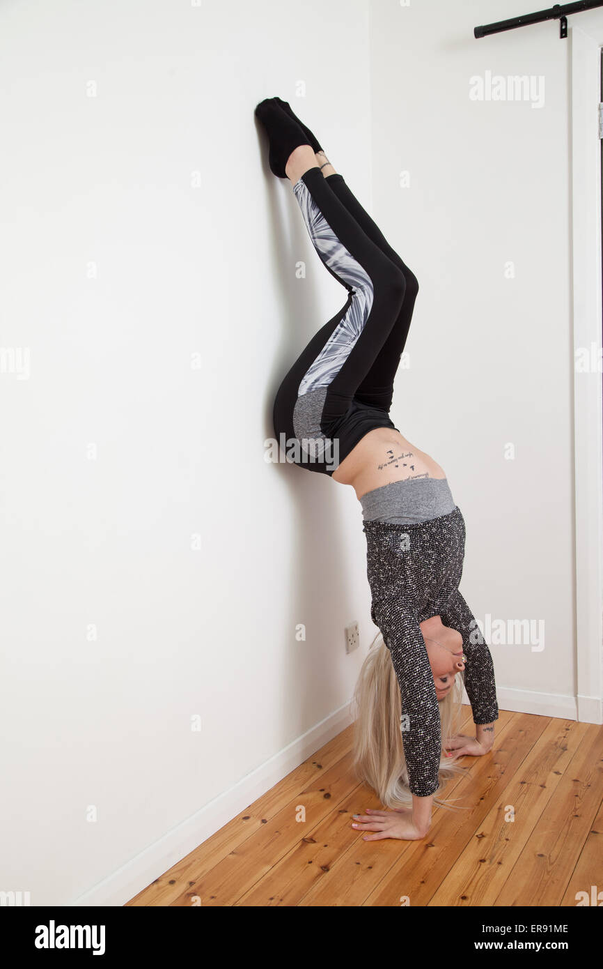 Handstand Against Wall High Resolution Stock Photography and Images - Alamy