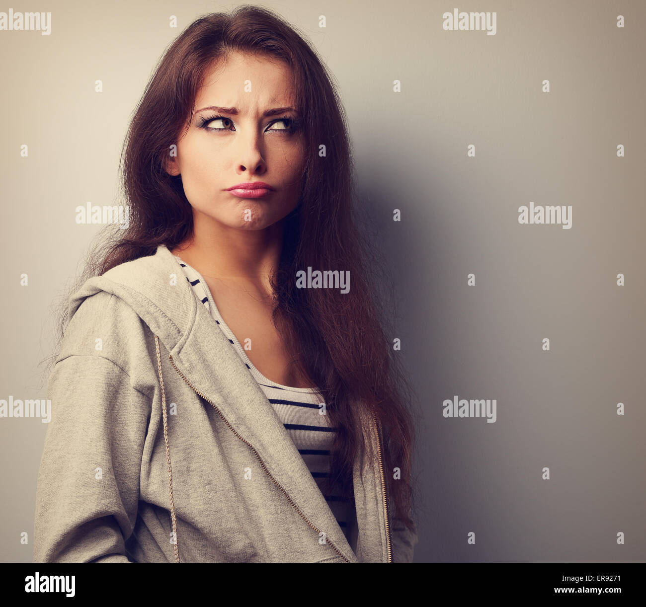 Grimacing Fun Young Woman Thinking And Looking Fun Vintage Portrait