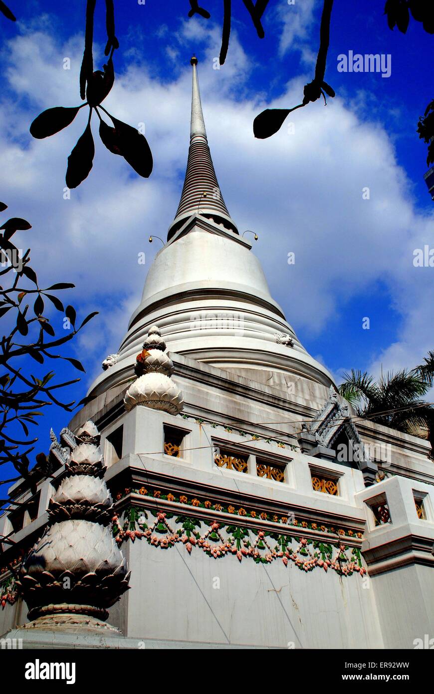 Bangkok, Thailand: Soaring white bell-shaped Chedi built atop a square ...