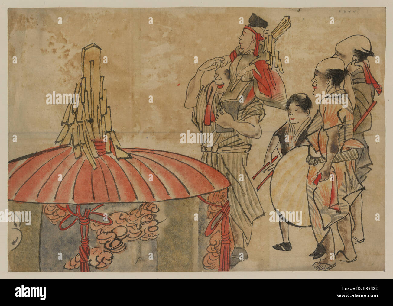 Actors or musicians standing next to a large, decorated cyli Stock ...