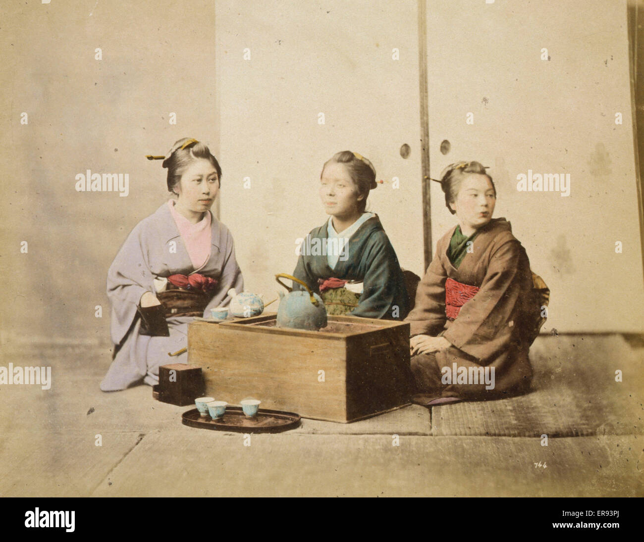 Three women having tea Stock Photo - Alamy