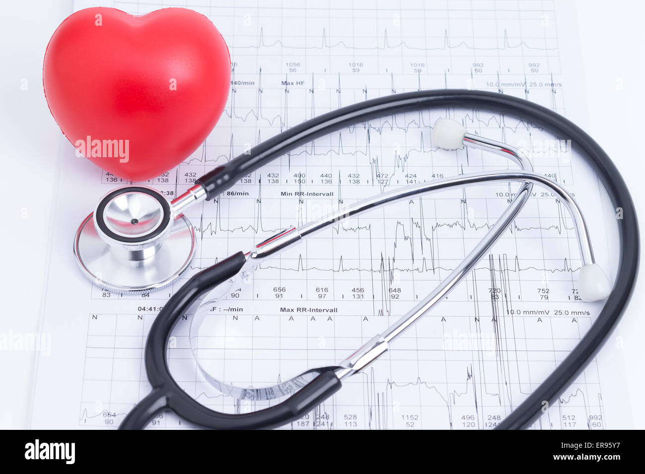 Image shows a red rubber heart with stethoscope and cardiogram Stock ...