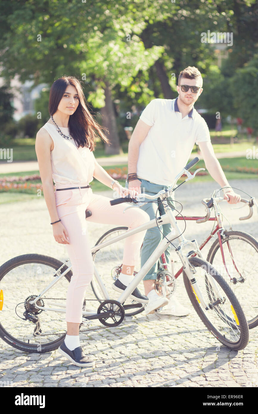 Young couple have bike riding Stock Photo - Alamy