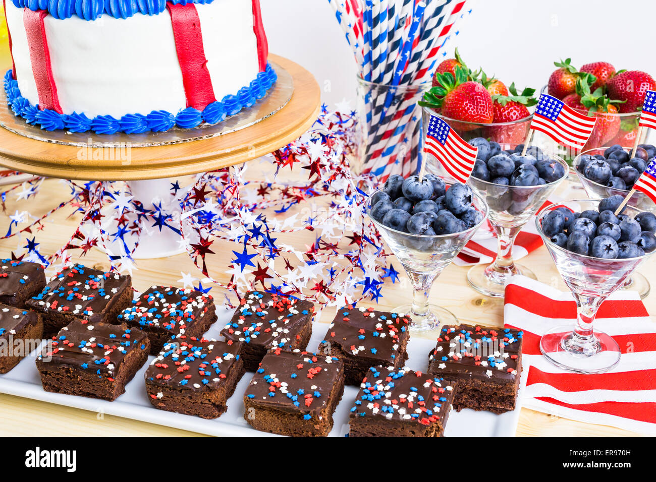 Variety of desserts on the table for July 4th party Stock Photo - Alamy
