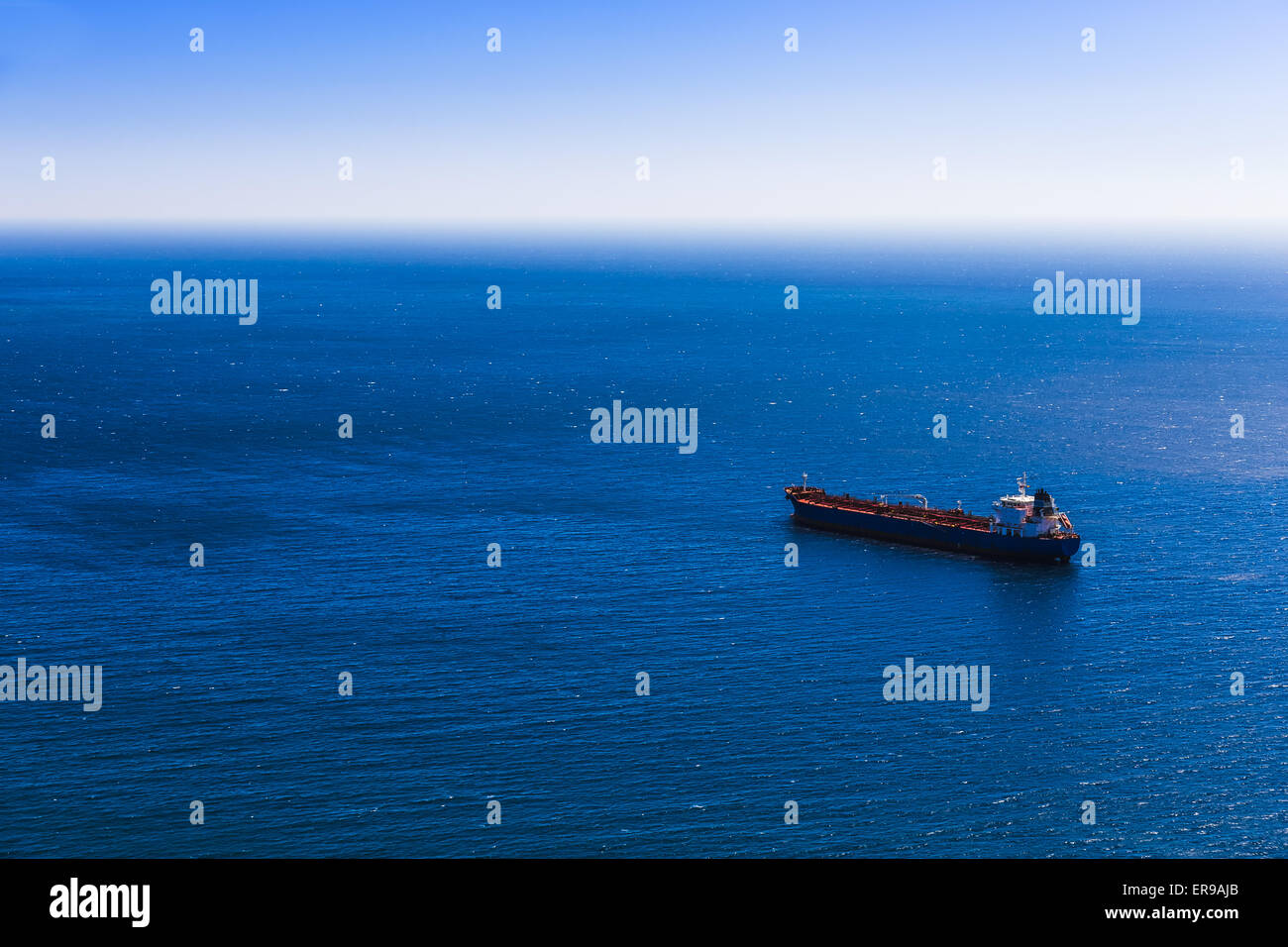 Empty container cargo ship in the blue sea. Aerial view Stock Photo - Alamy