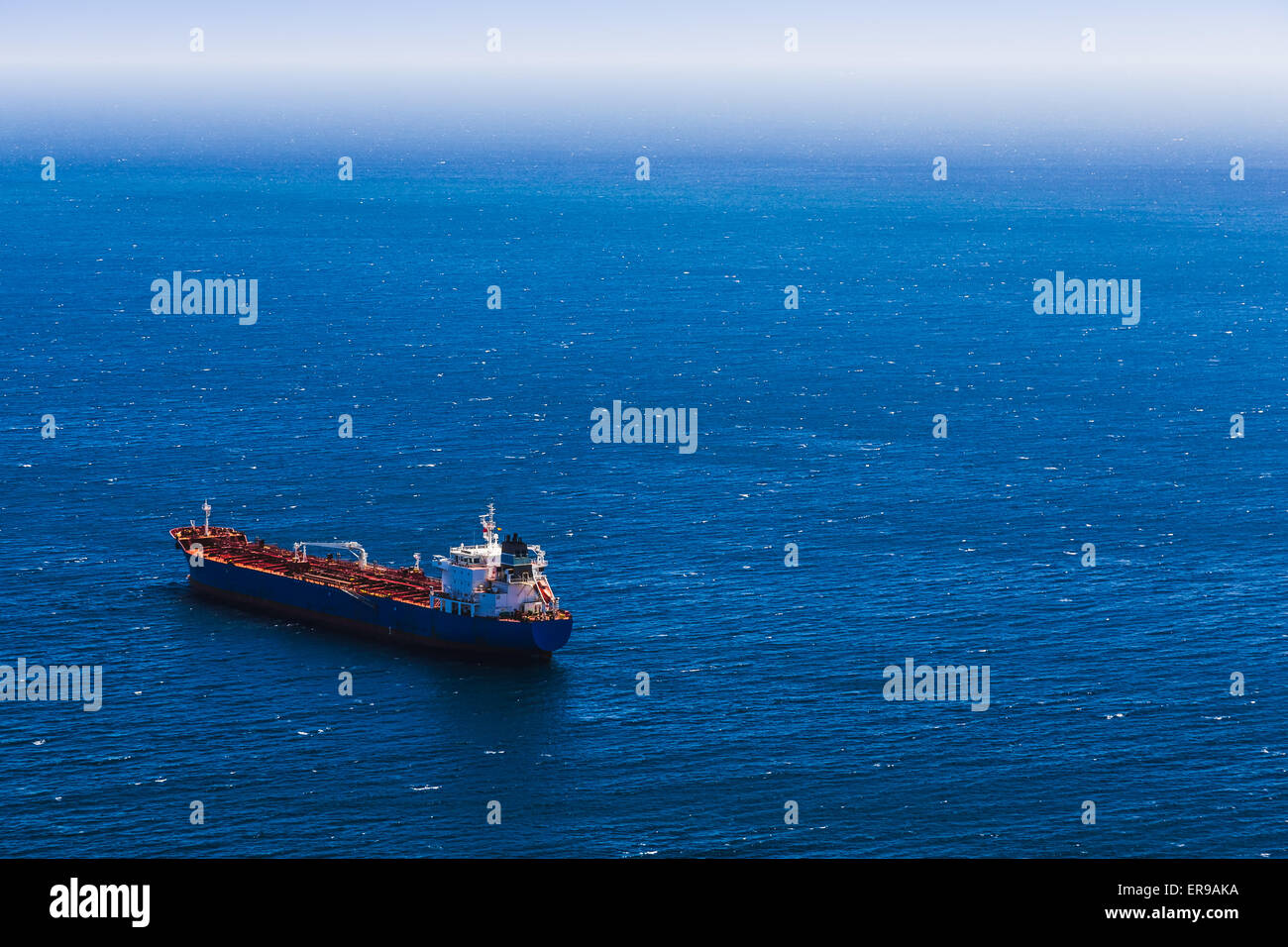 View from above to container cargo ship in the blue ocean Stock Photo ...