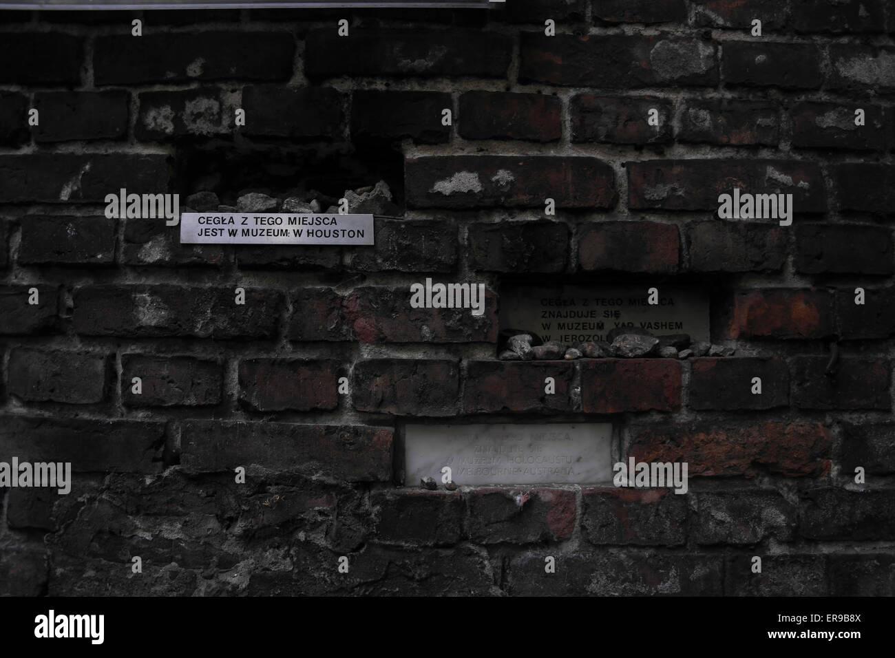 Red brick Warsaw Ghetto Wall section, with bricks removed by museums in ...