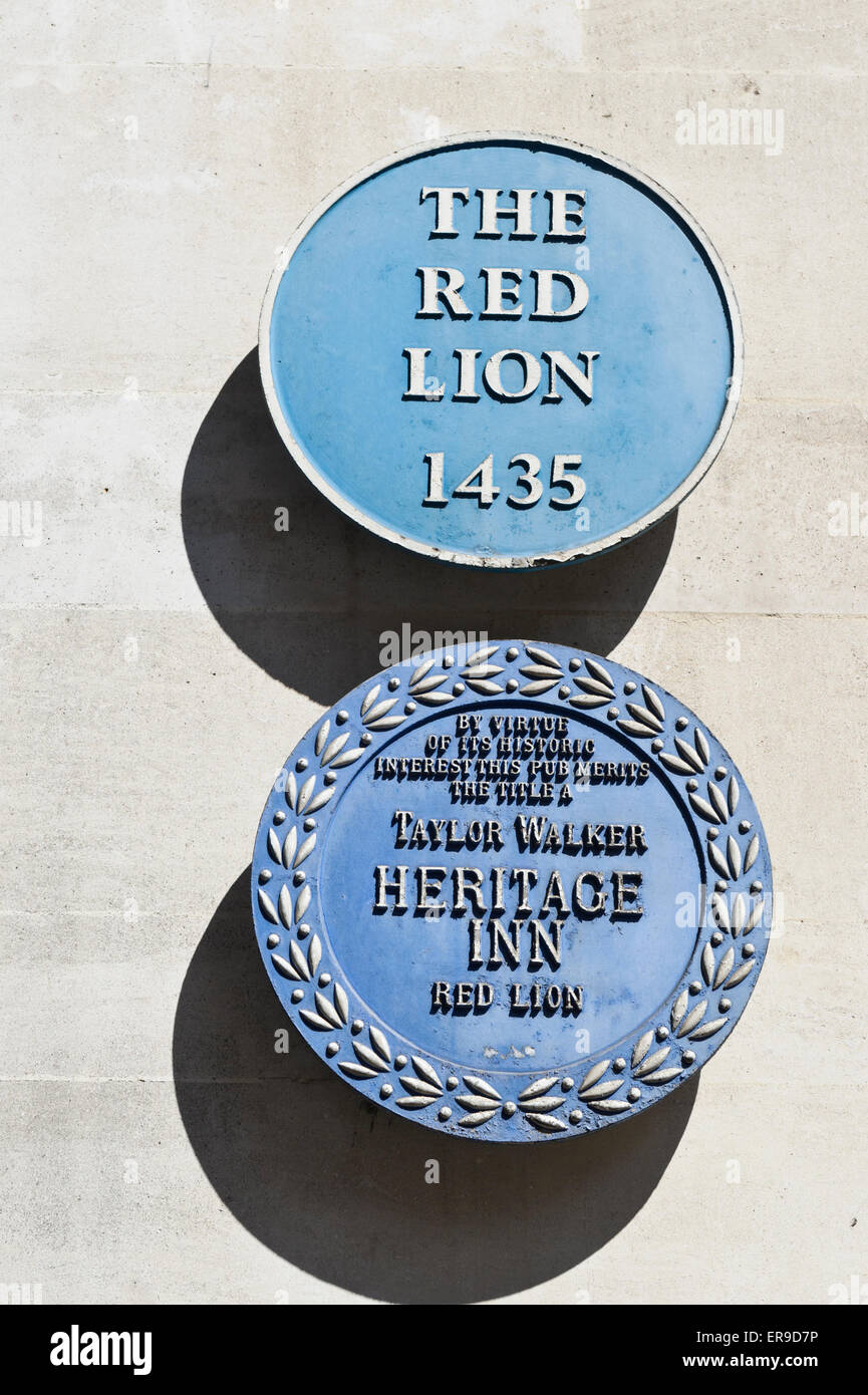 A blue commemorative plague of the Red Lion public house which was ...