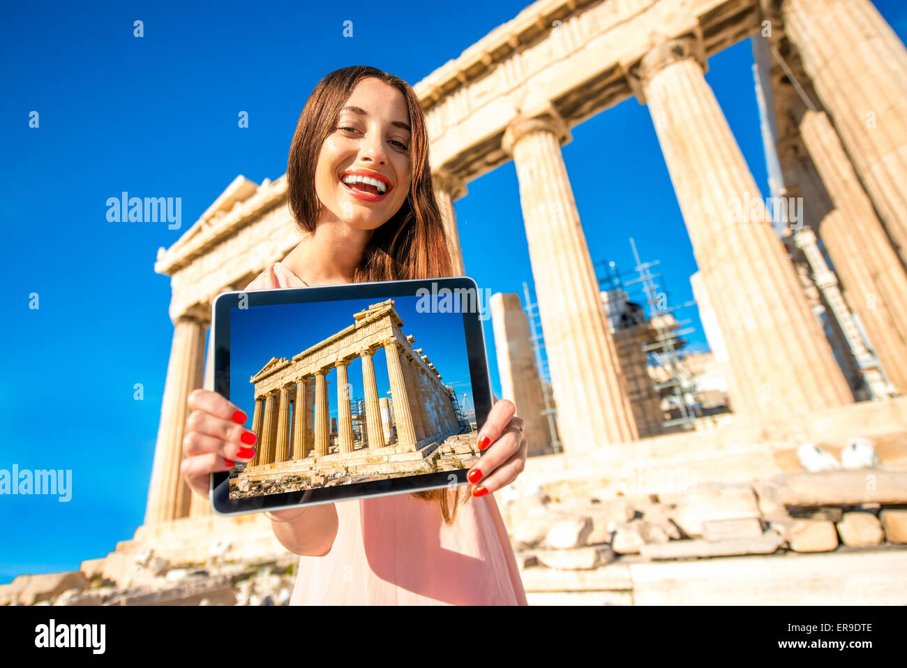 Woman advertising Acropolis Stock Photo - Alamy