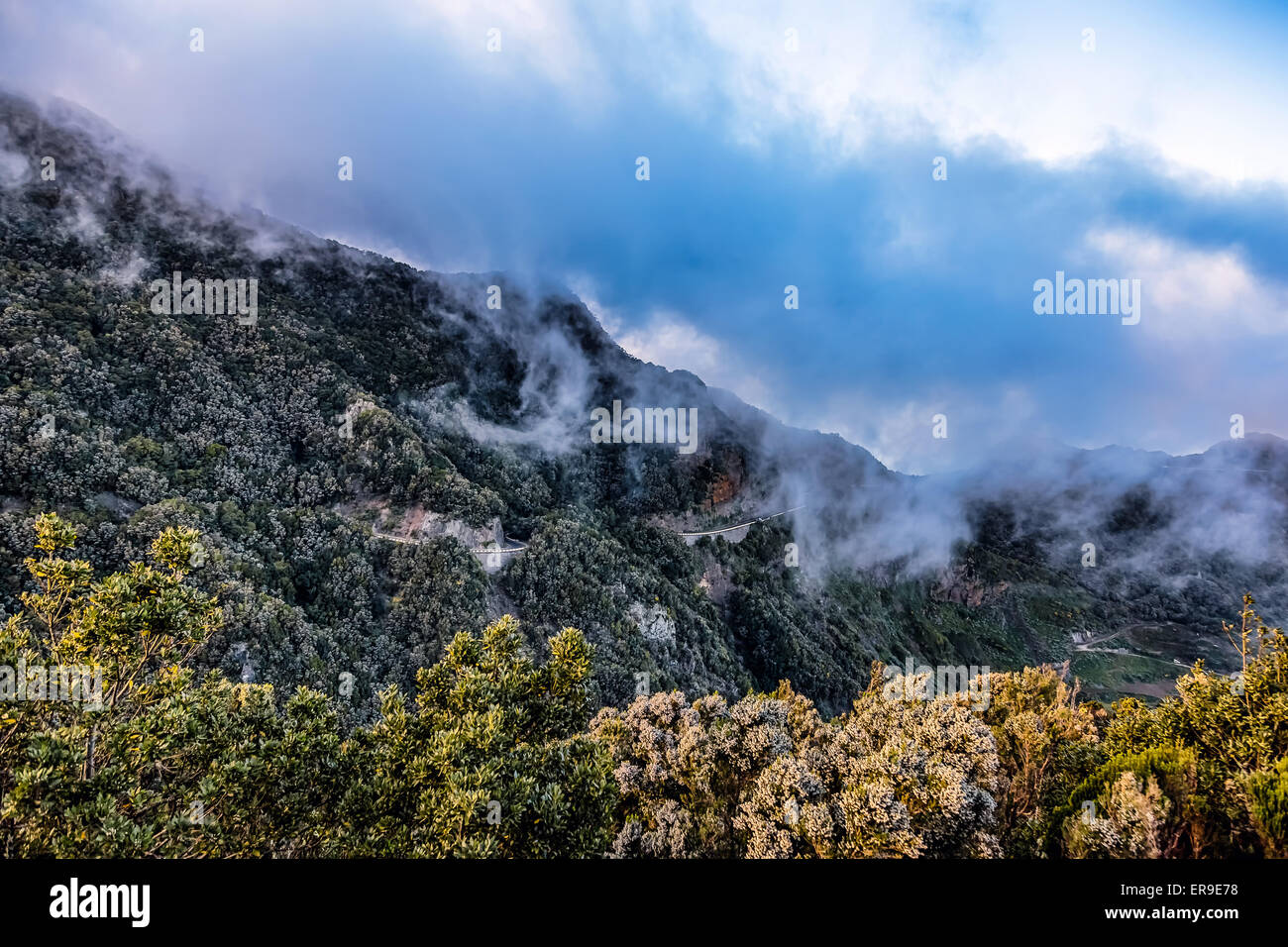 Landscape with clouds over mountain peak with road in Tenerife Canary ...