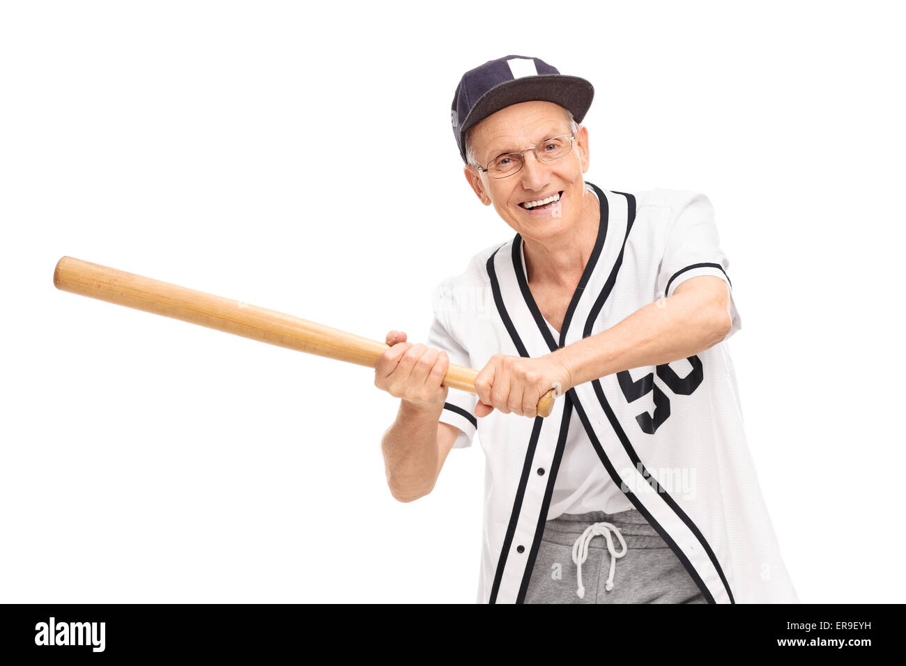 Senior in a baseball jersey swinging a baseball bat and looking at the ...