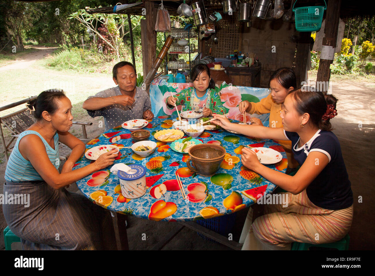 In the open air, but shaded, dining area of their house in the Burmese ...