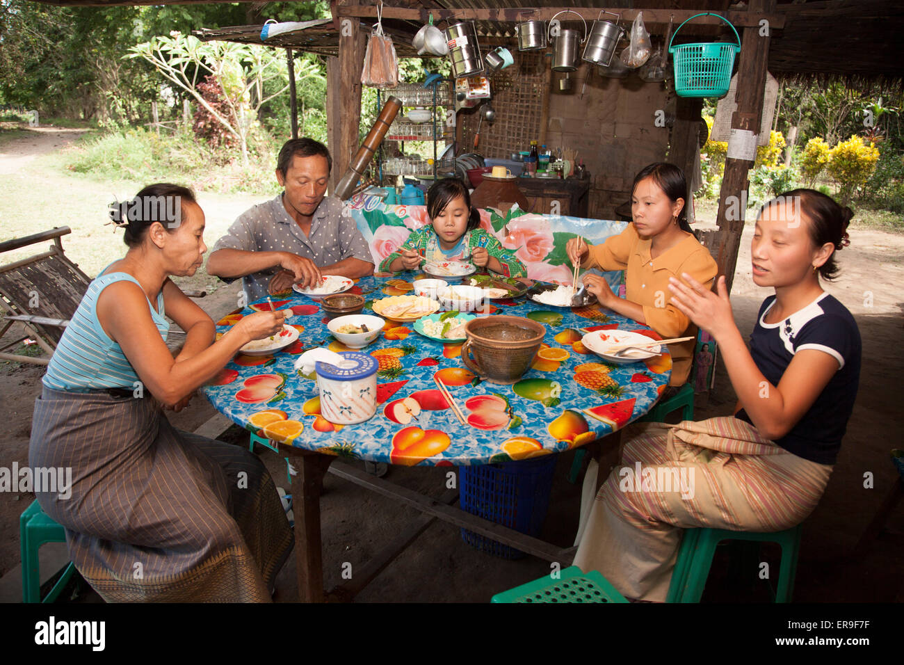 In the open air, but shaded, dining area of their house in the Burmese ...