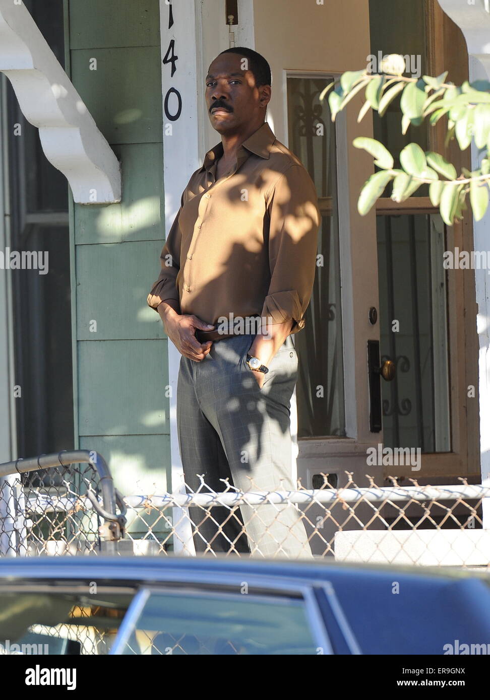 Eddie Murphy wears 1970's attire for his new movie role in "Cook ...