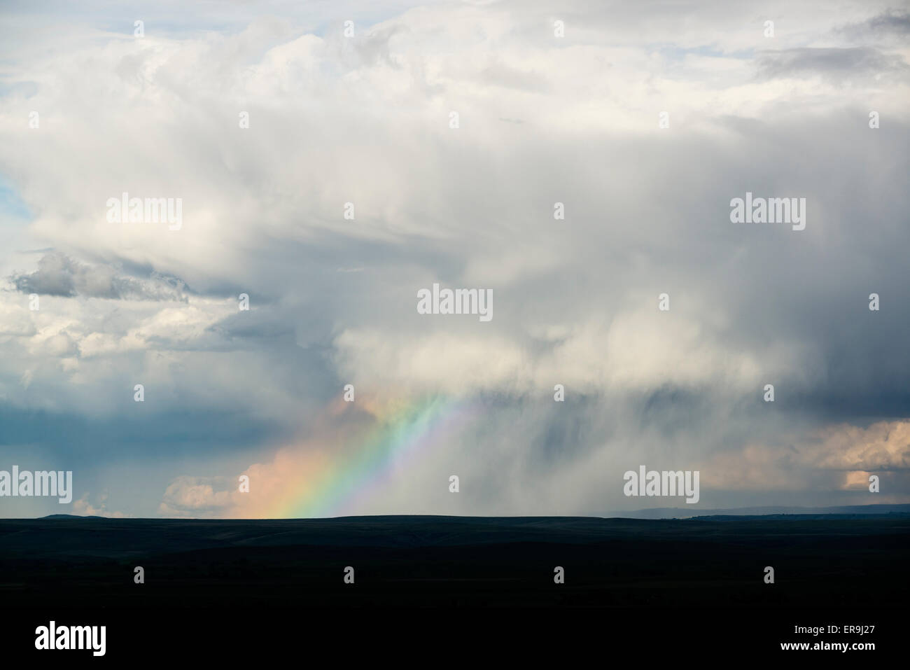 Storm cloud and rainbow over Oregon's Wallowa Valley Stock Photo - Alamy