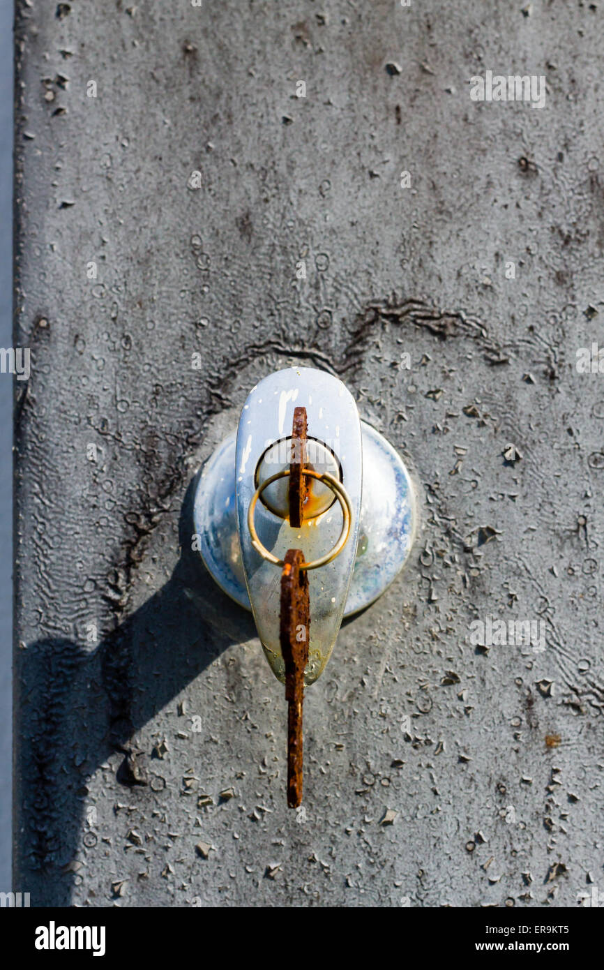 Close-up shot of an old rusty key inside a keyhole Stock Photo - Alamy