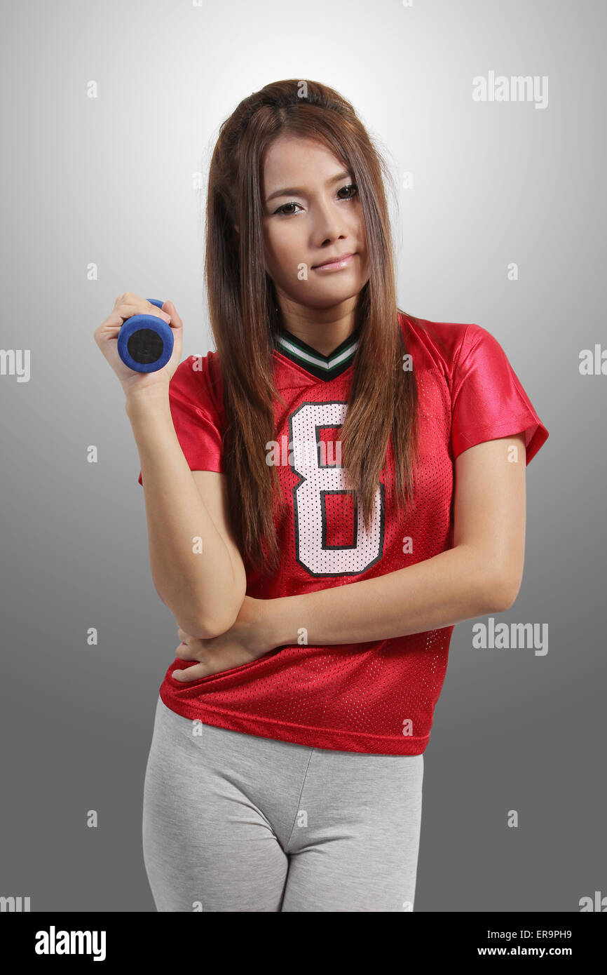 young asian woman in fitness clothes and dumbbell Stock Photo - Alamy