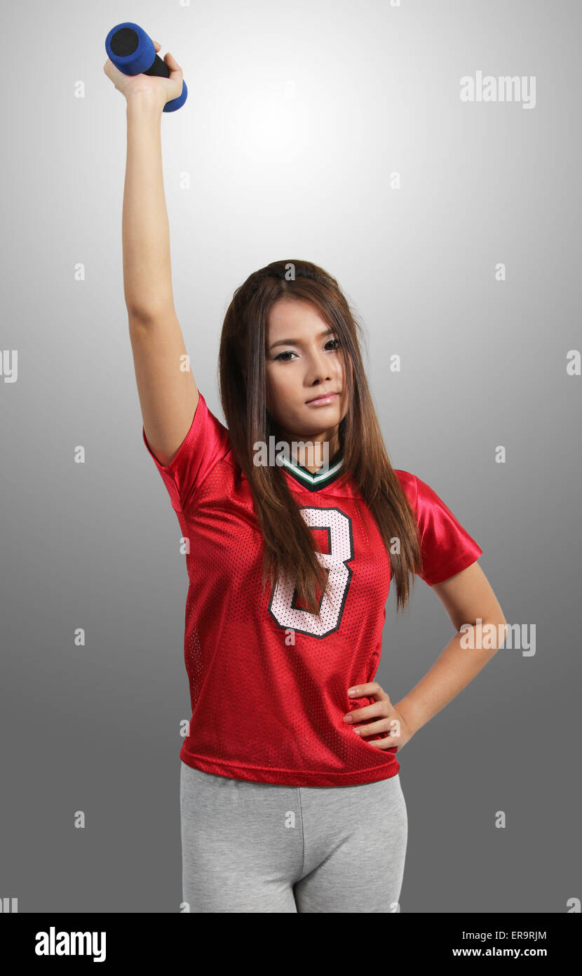 young asian woman in fitness clothes and dumbbell Stock Photo - Alamy