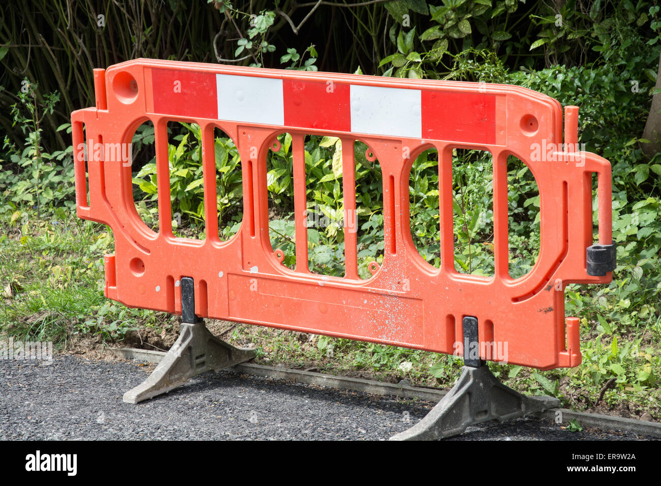 Red standing barrier hi-res stock photography and images - Alamy