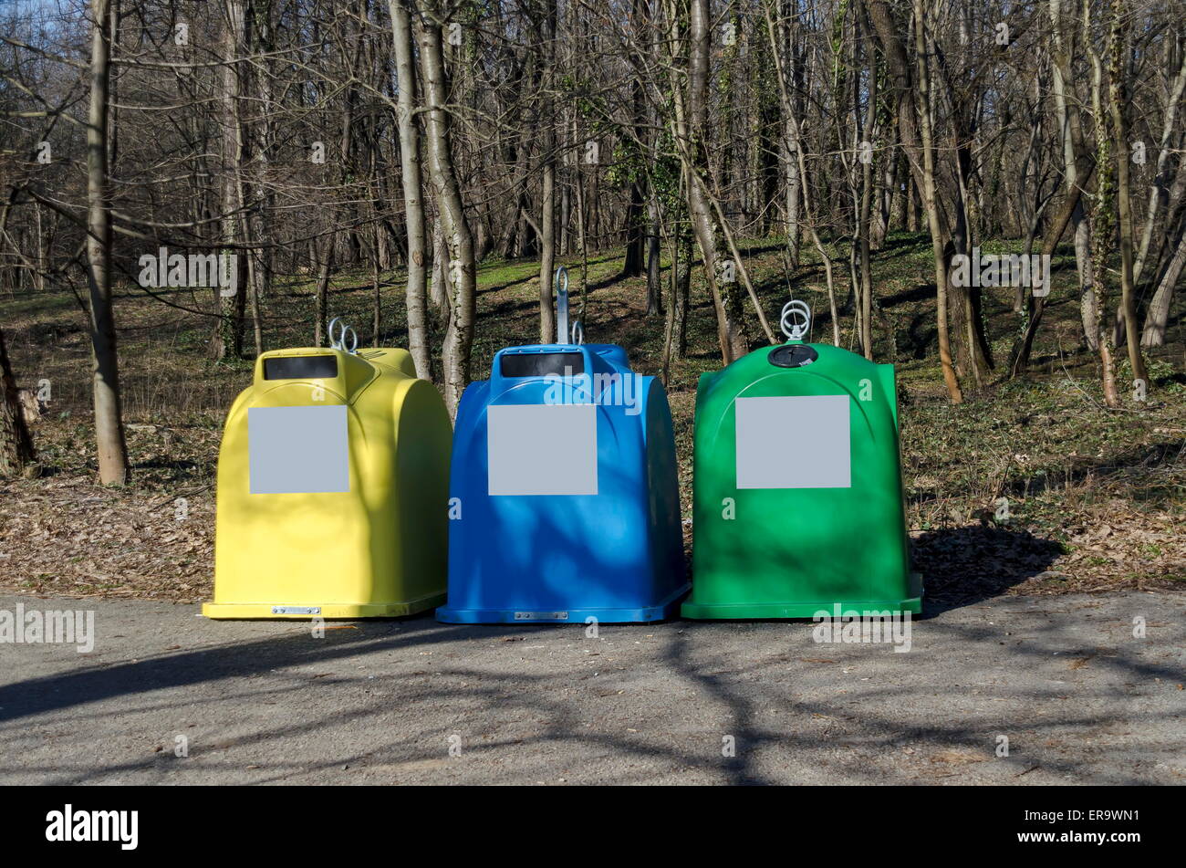Garbage trash cans containers for division collection at park Stock ...