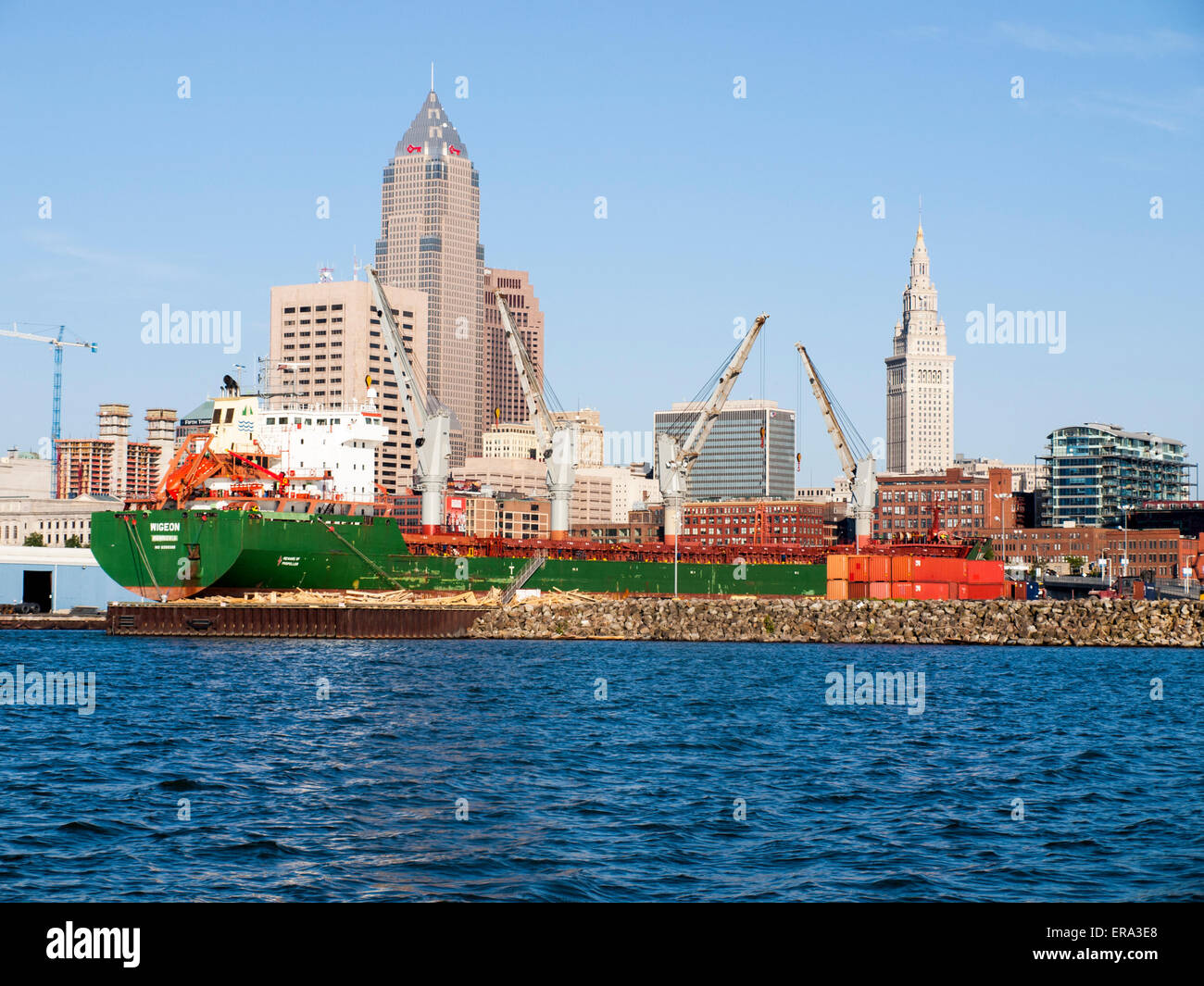 A cargo ship being loaded in a dock of the Port of Cleveland Stock ...