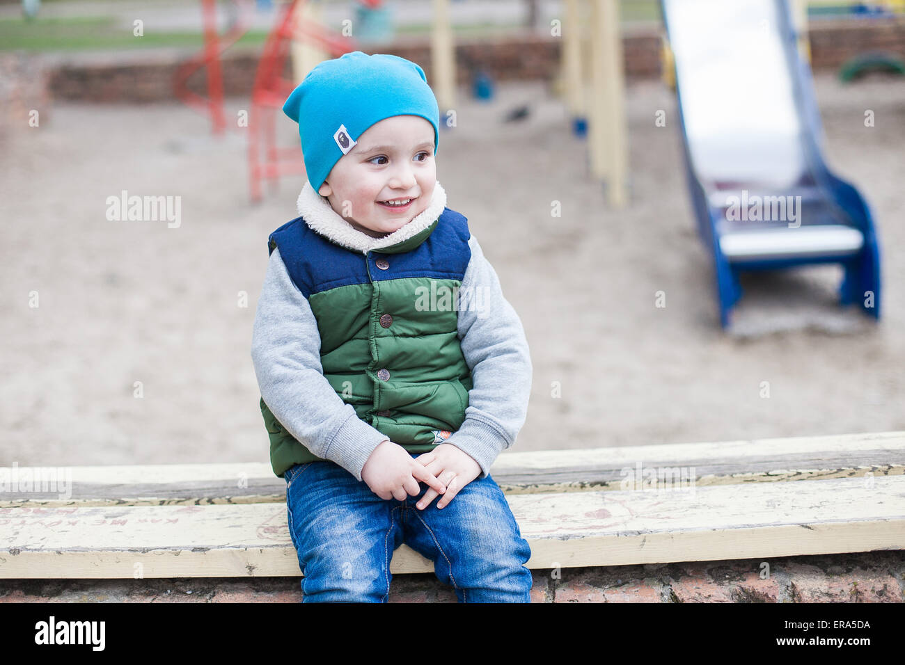 Little boy on playground Stock Photo - Alamy