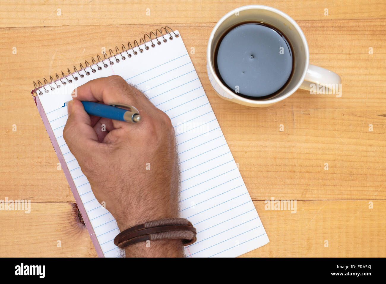 Starting to take notes, pen notepad, coffee Stock Photo - Alamy