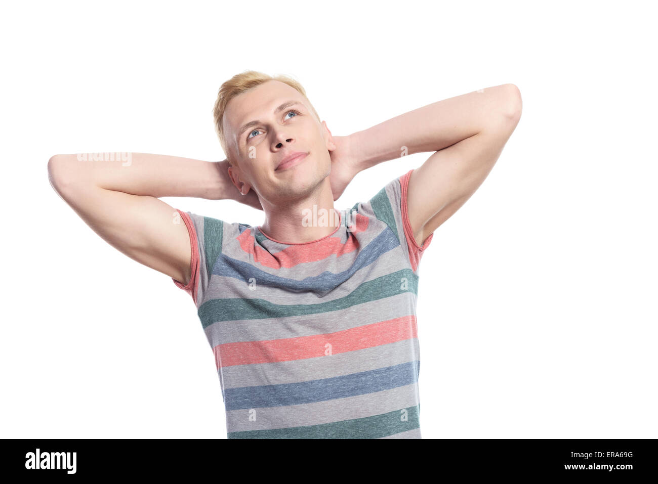 Man with arms behind his head Stock Photo - Alamy