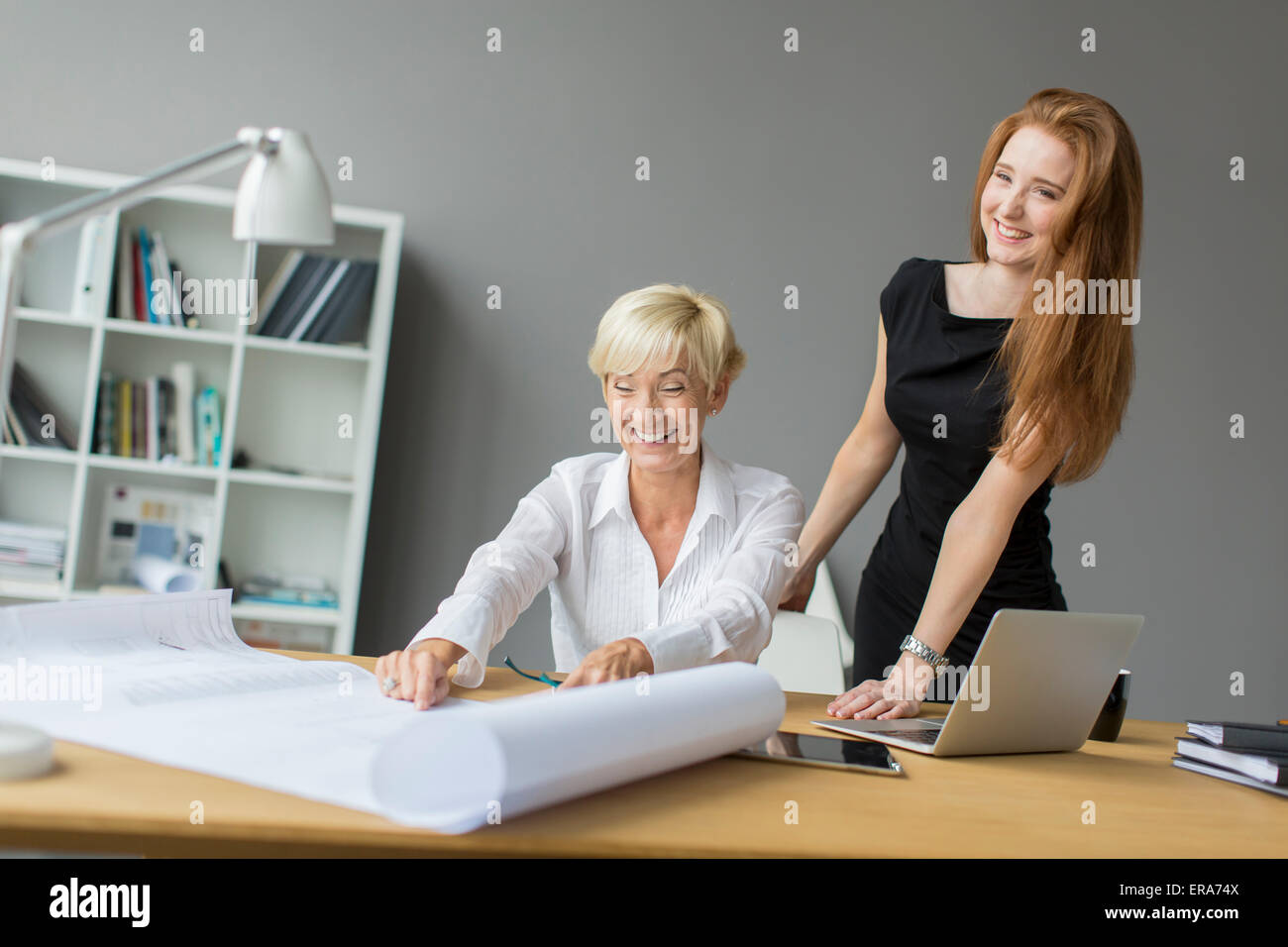 Women working in the office Stock Photo - Alamy