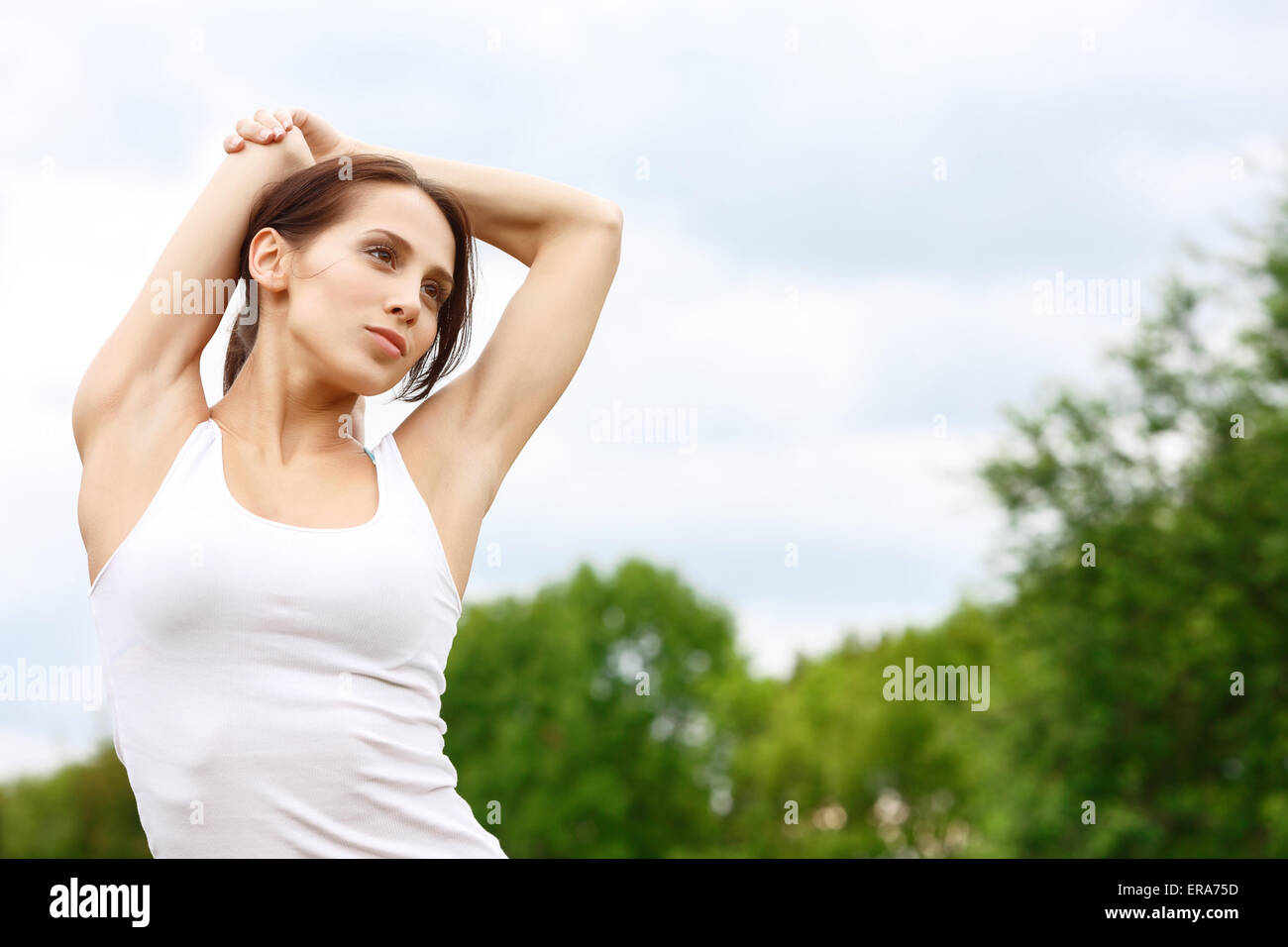 Woman Arms Behind Head