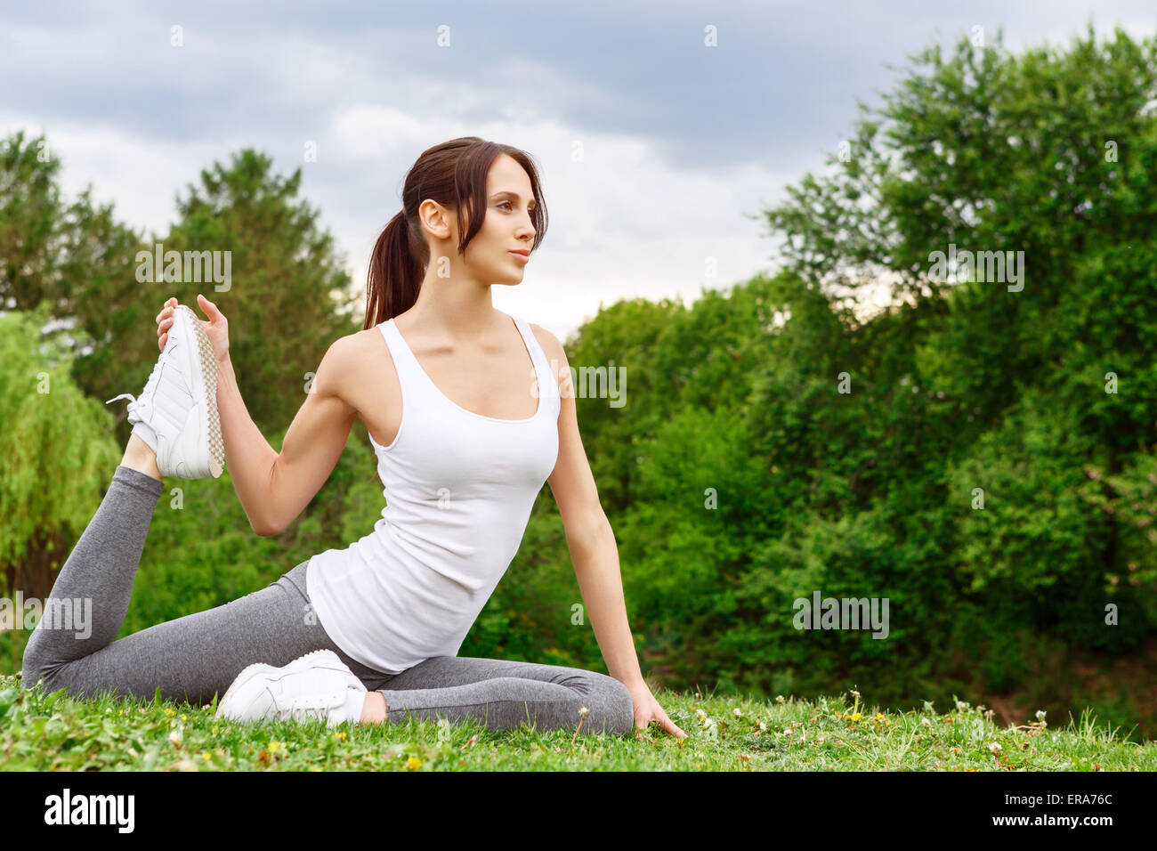 Woman doing stretching exercises Stock Photo - Alamy